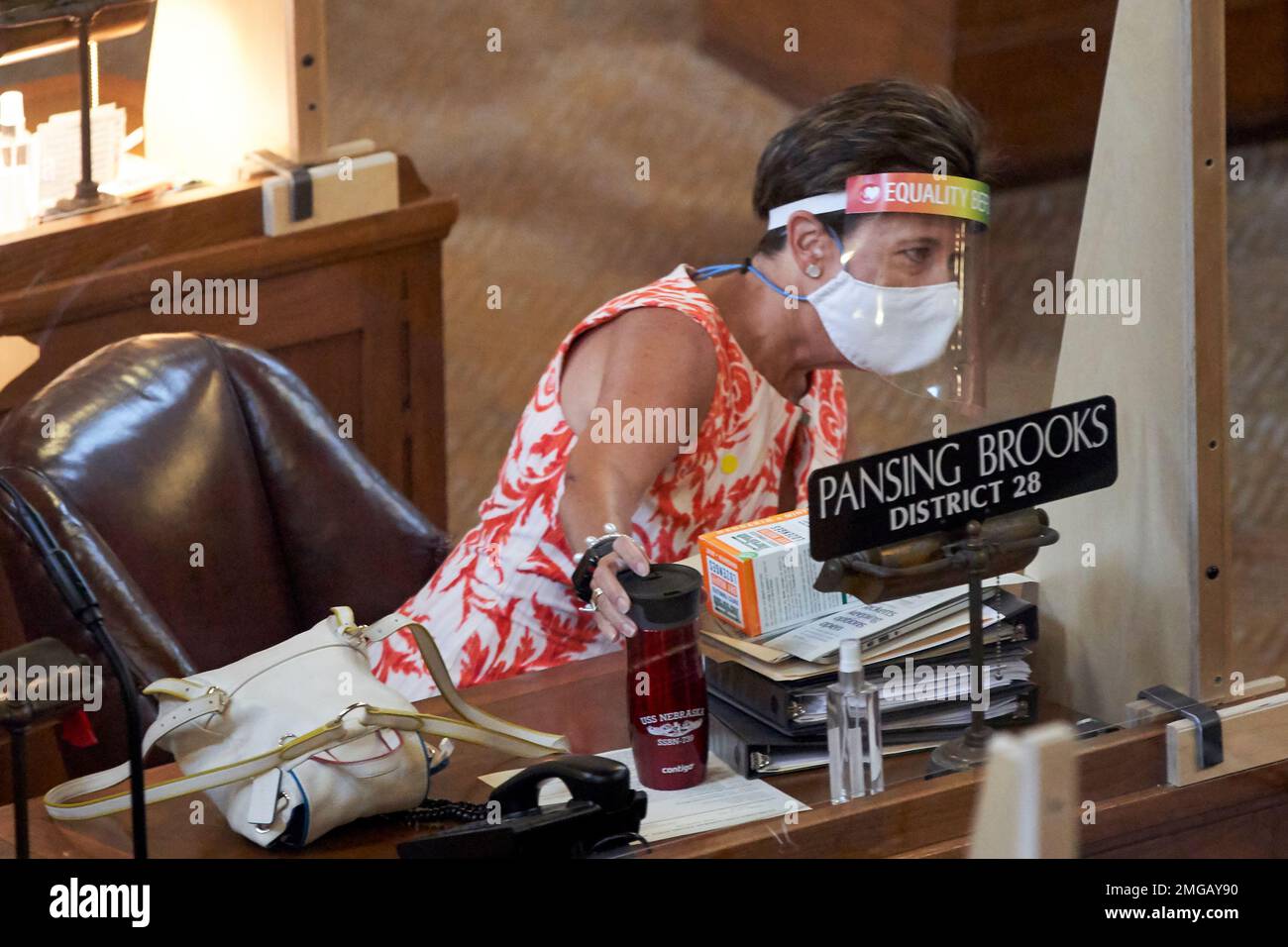 Sen. Patty Pansing Brooks of Lincoln takes her seat at the Legislative ...