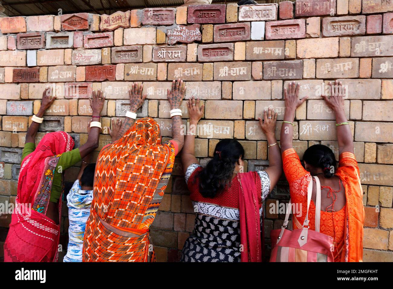 FILE- In this Nov. 11, 2019, file photo, Hindu women devotees pray to ...