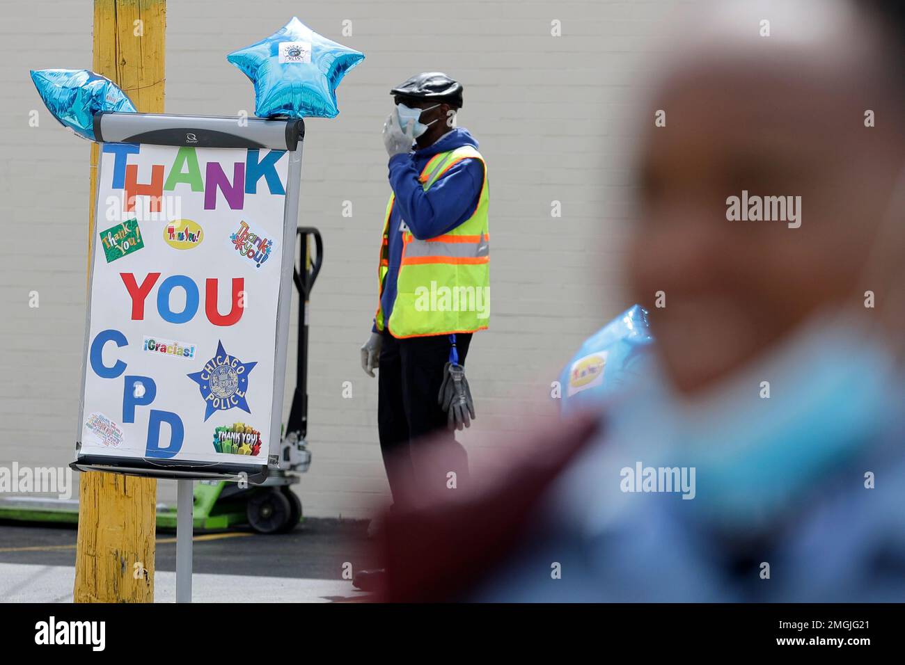 World Vision staff James Walker waits for the Chicago Police, Fire ...