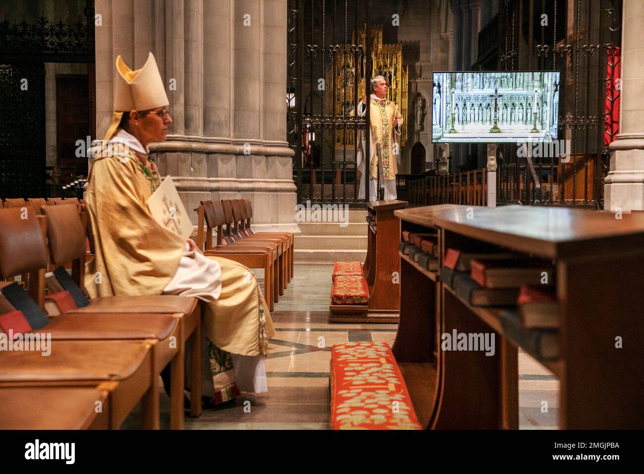 Rt. Rev. Mariann Edgar Budde, at left, Bishop of the Episcopal Diocese ...