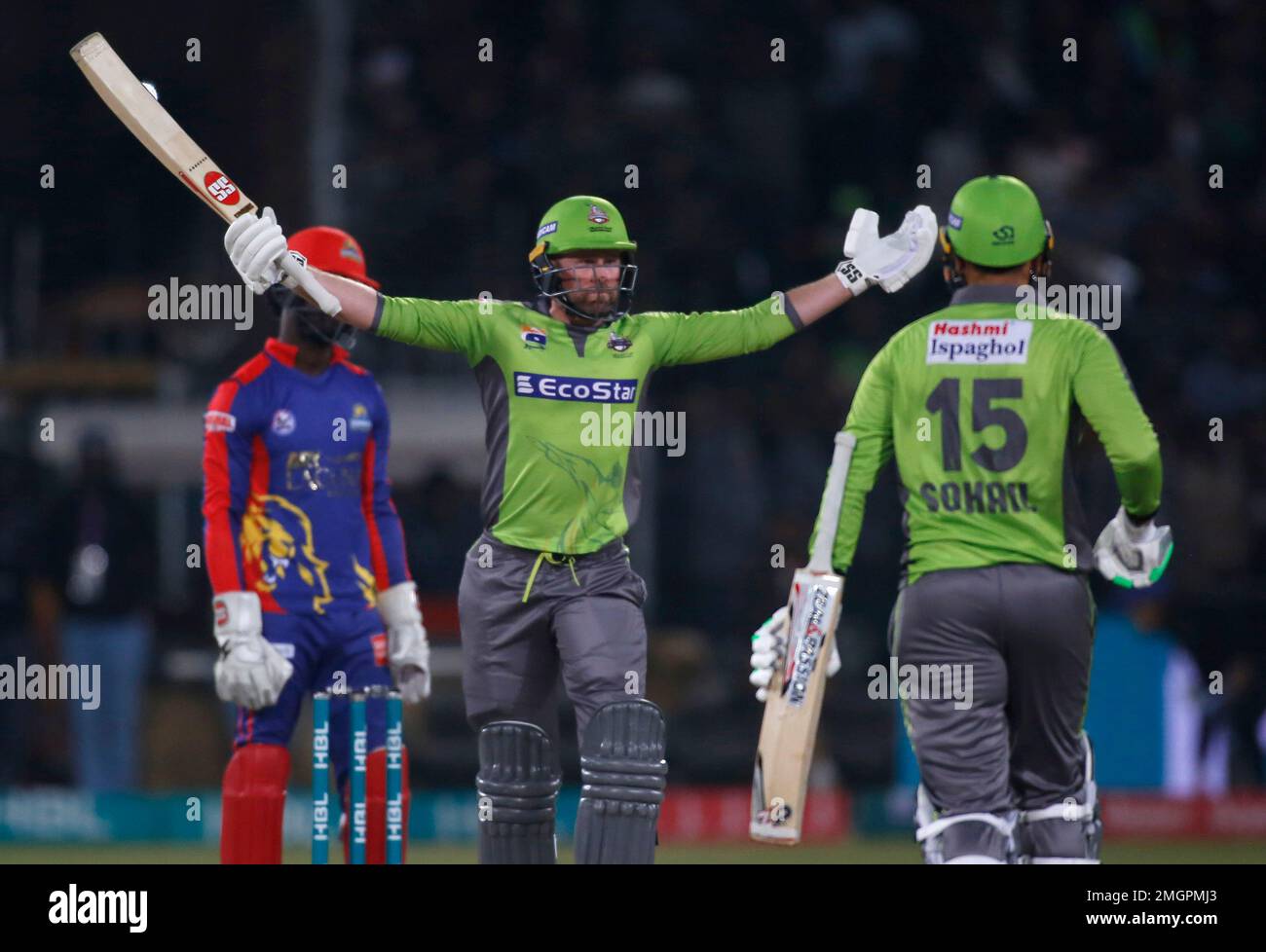 Lahore Qalandars batsman Ben Dunk, center, reacts after scoring winning ...