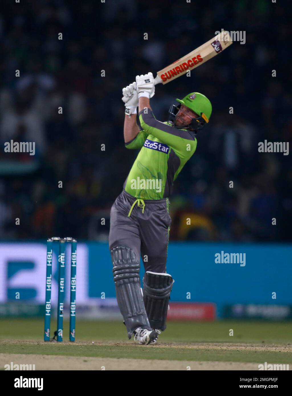 Lahore Qalandars batsman Ben Dunk plays a shot for boundary during a ...