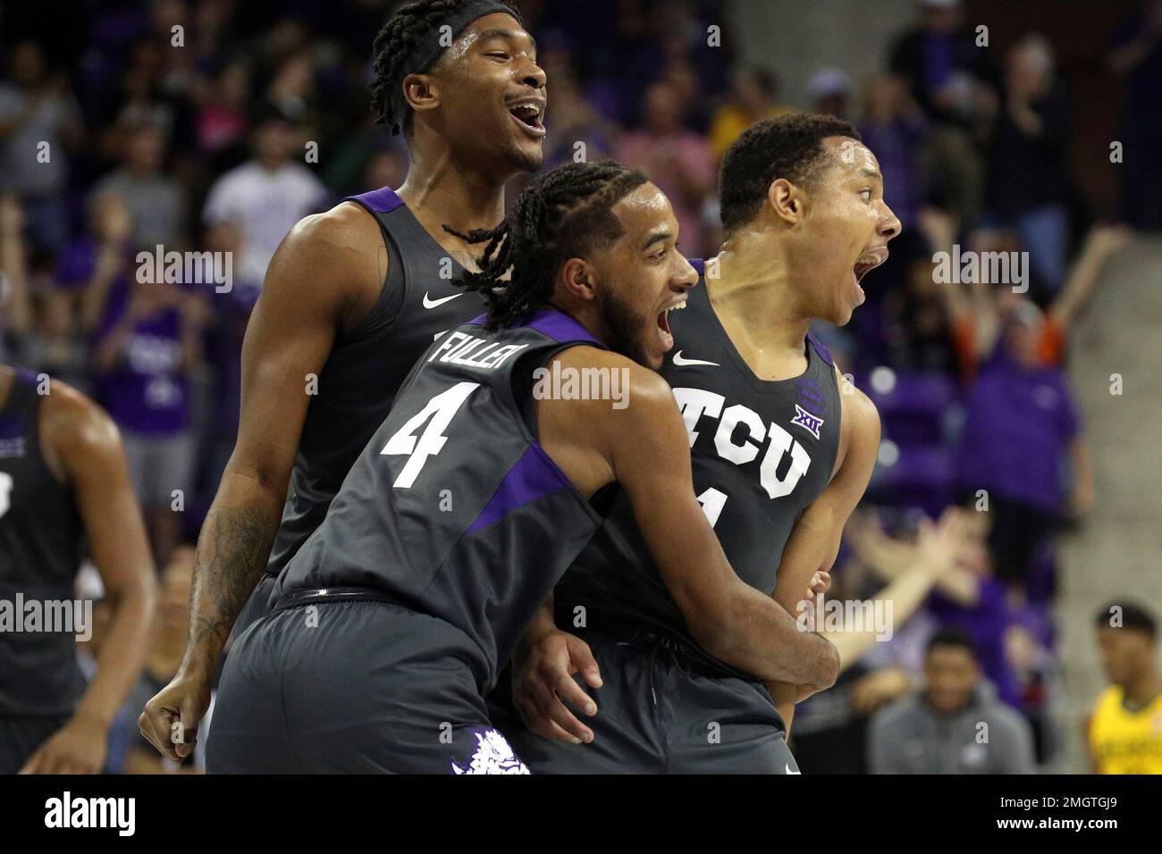 TCU forward Diante Smith (10) and PJ Fuller (4) celebrate a three ...
