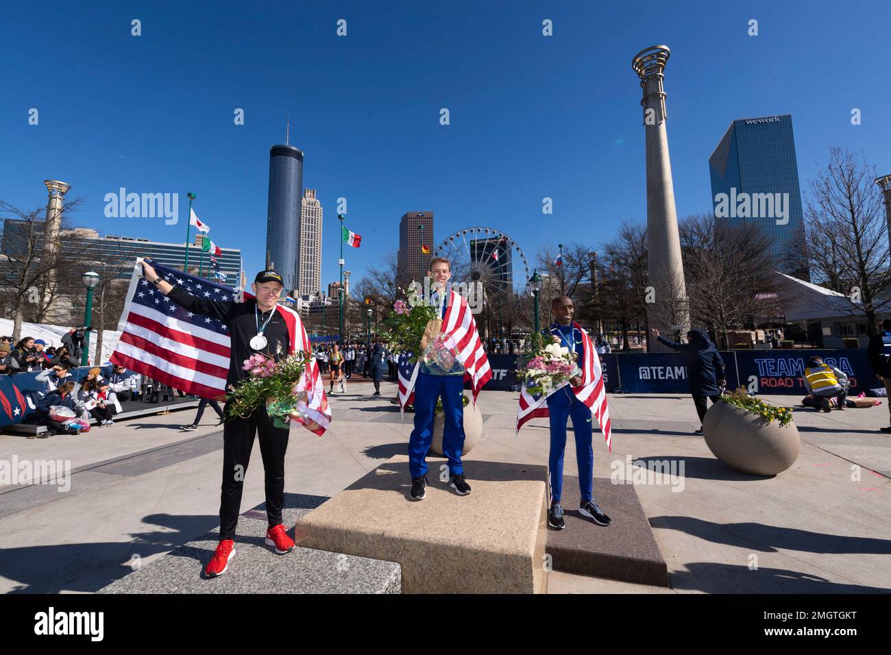 First place finisher Galen Rupp, center second place finisher Jacob ...