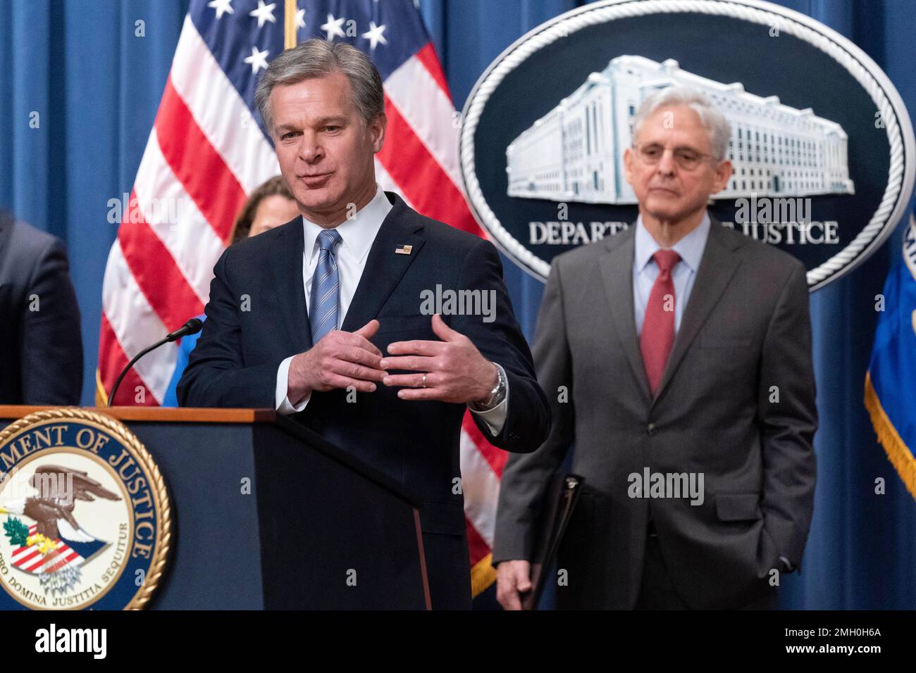 Federal Bureau of Investigation (FBI) Director Christopher Wray flanked ...