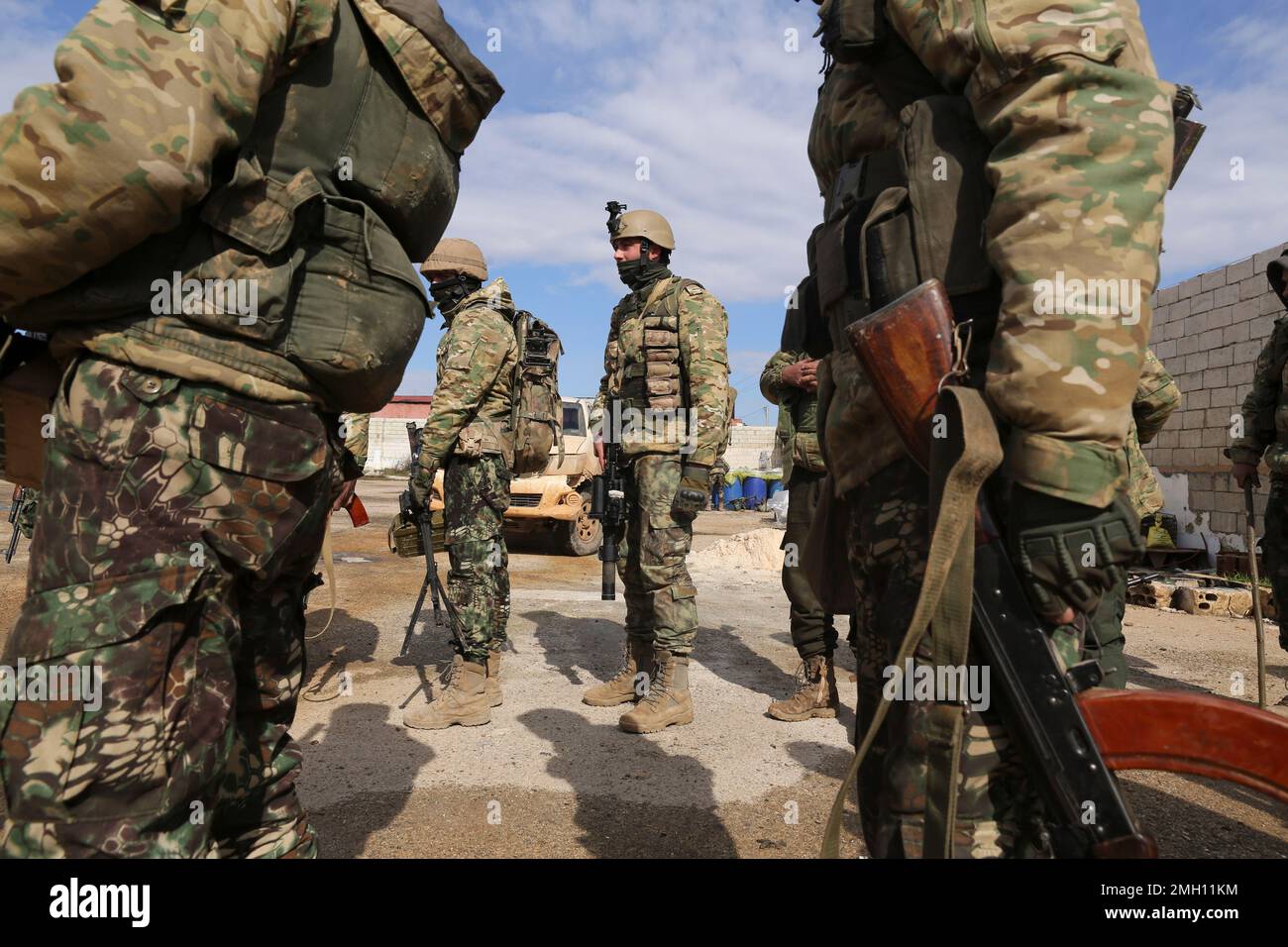 Turkish backed fighter prepare to go to the frontline in the Syrian ...