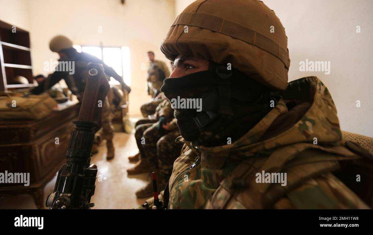 Turkish backed fighter prepare to go to the frontline in the Syrian ...