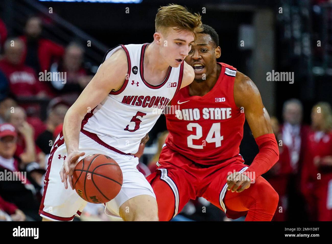 Wisconsin's Tyler Wahl (5) drives against Ohio State's Andre Wesson (24 ...