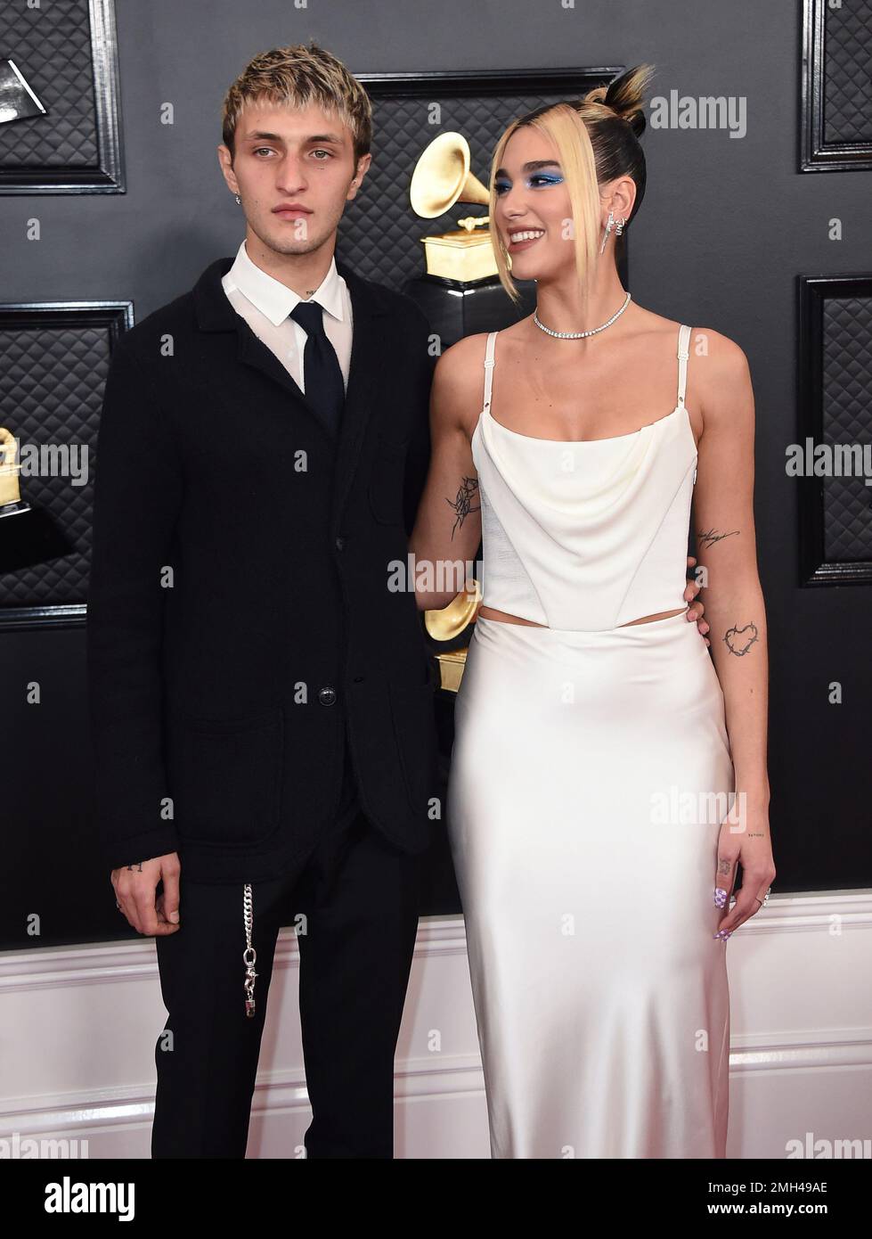 Anwar Hadid, left, and Dua Lipa arrive at the 62nd annual Grammy Awards ...