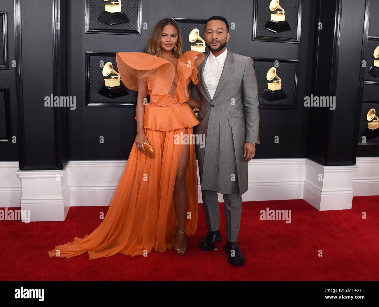 Chrissy Teigen, left, and John Legend arrive at the 62nd annual Grammy ...