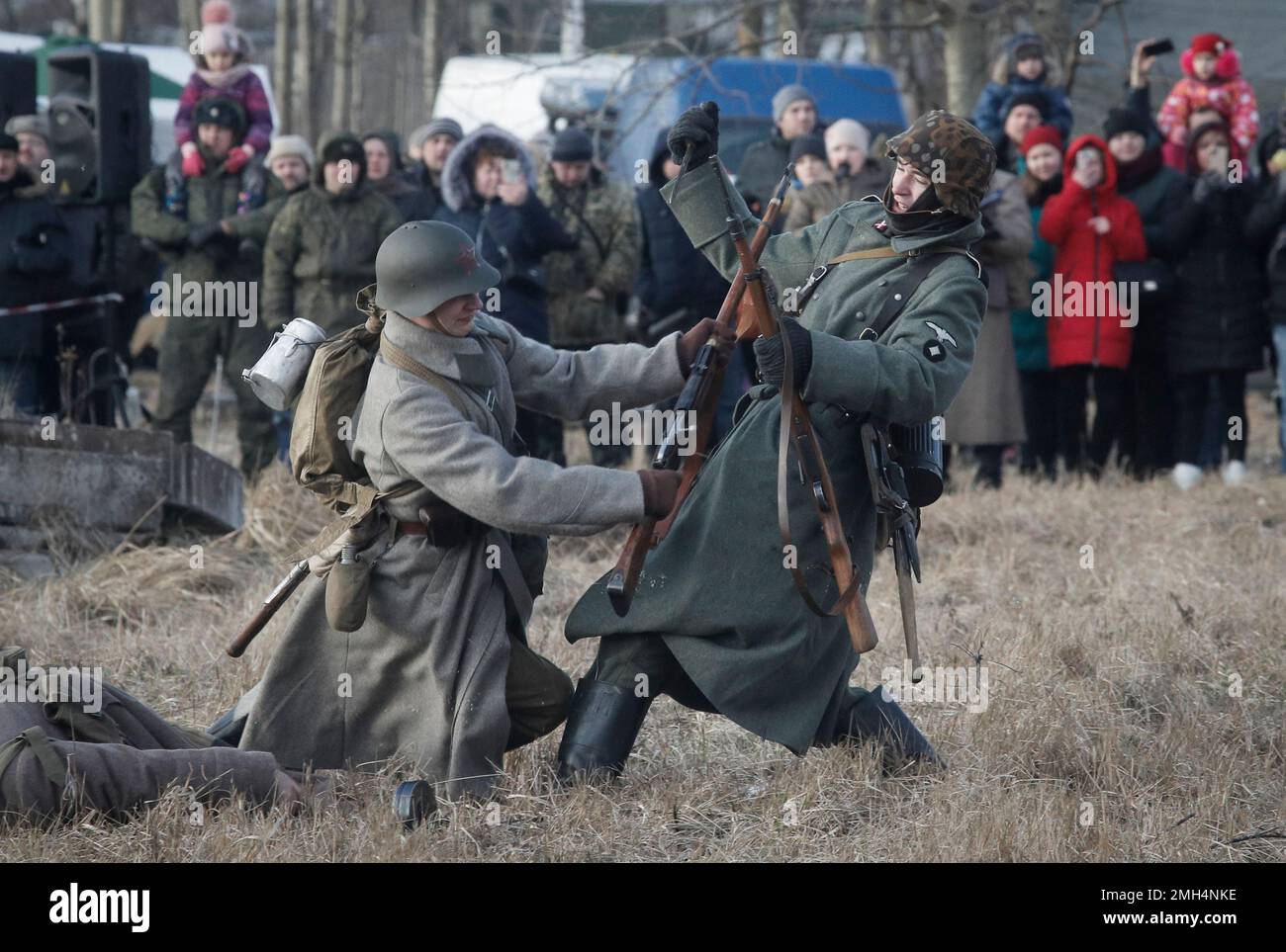 Members of historical military clubs wearing Nazi German, right, and ...