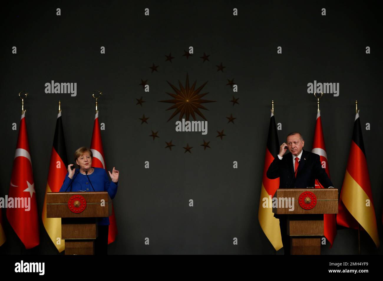 Germany's Chancellor Angela Merkel, left, talks during a joint news ...