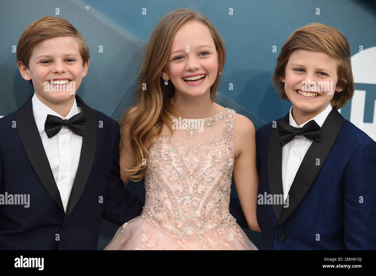 Cameron Crovetti, from left, Ivy George, and Nicholas Crovetti arrive ...