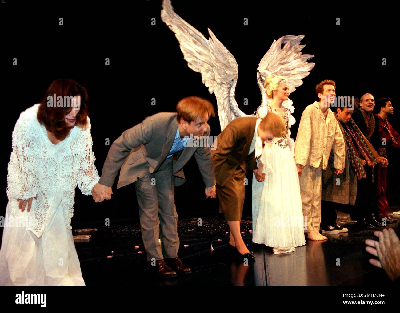 Cast members of "Angels in America" take their bows on opening night at ...
