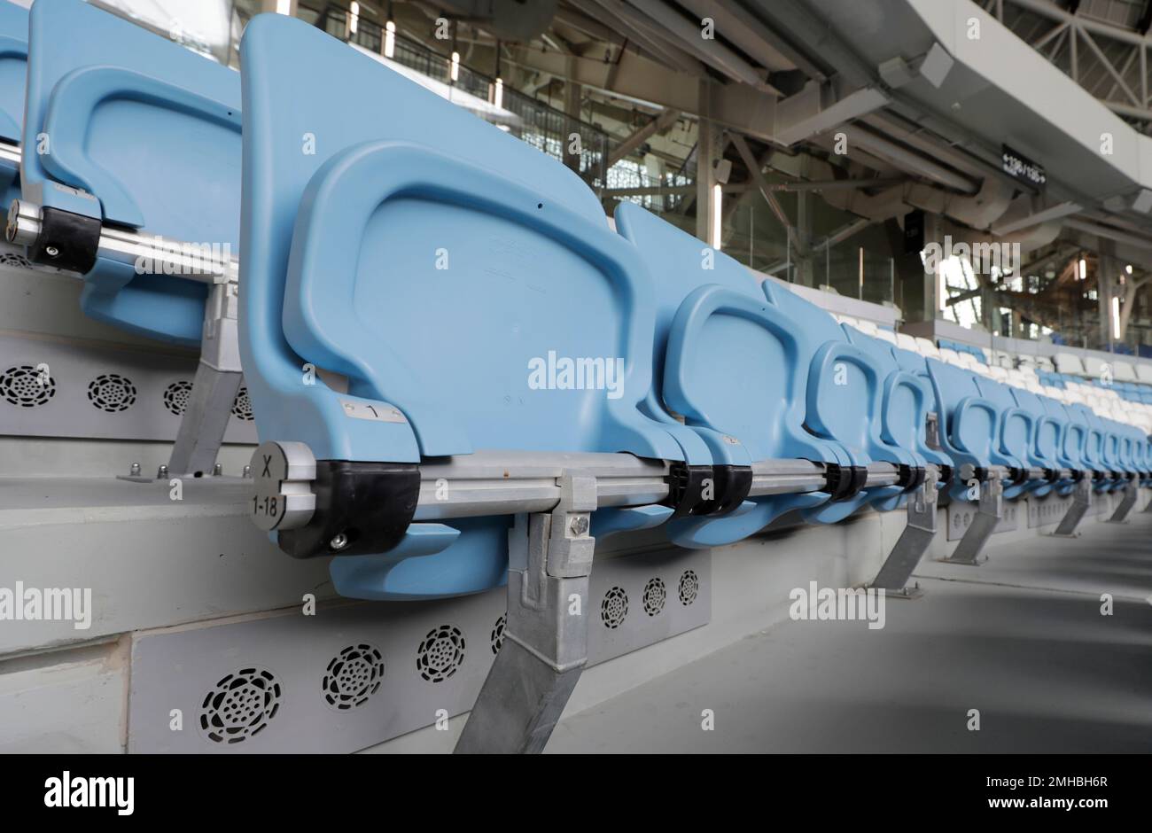 Air conditioning system is seen under the spectators stadium seating of ...