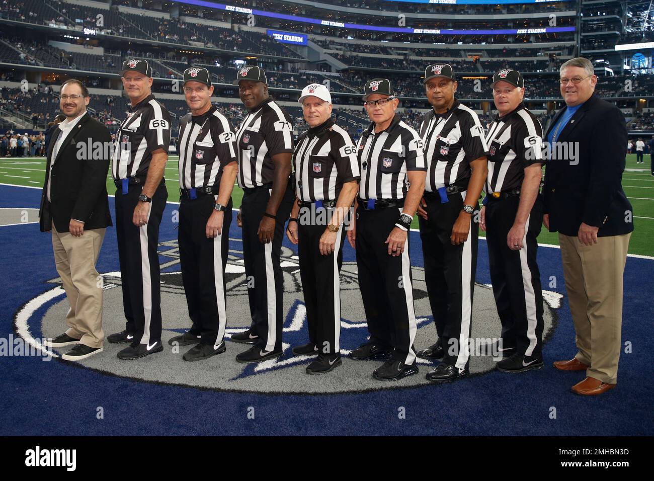 NFL game officlals, from left, replay official Brian Matoren, down ...
