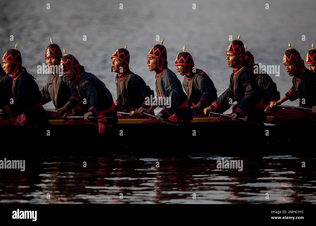 Oarsmen paddle during the Royal Barge Procession on the Chao Phraya ...