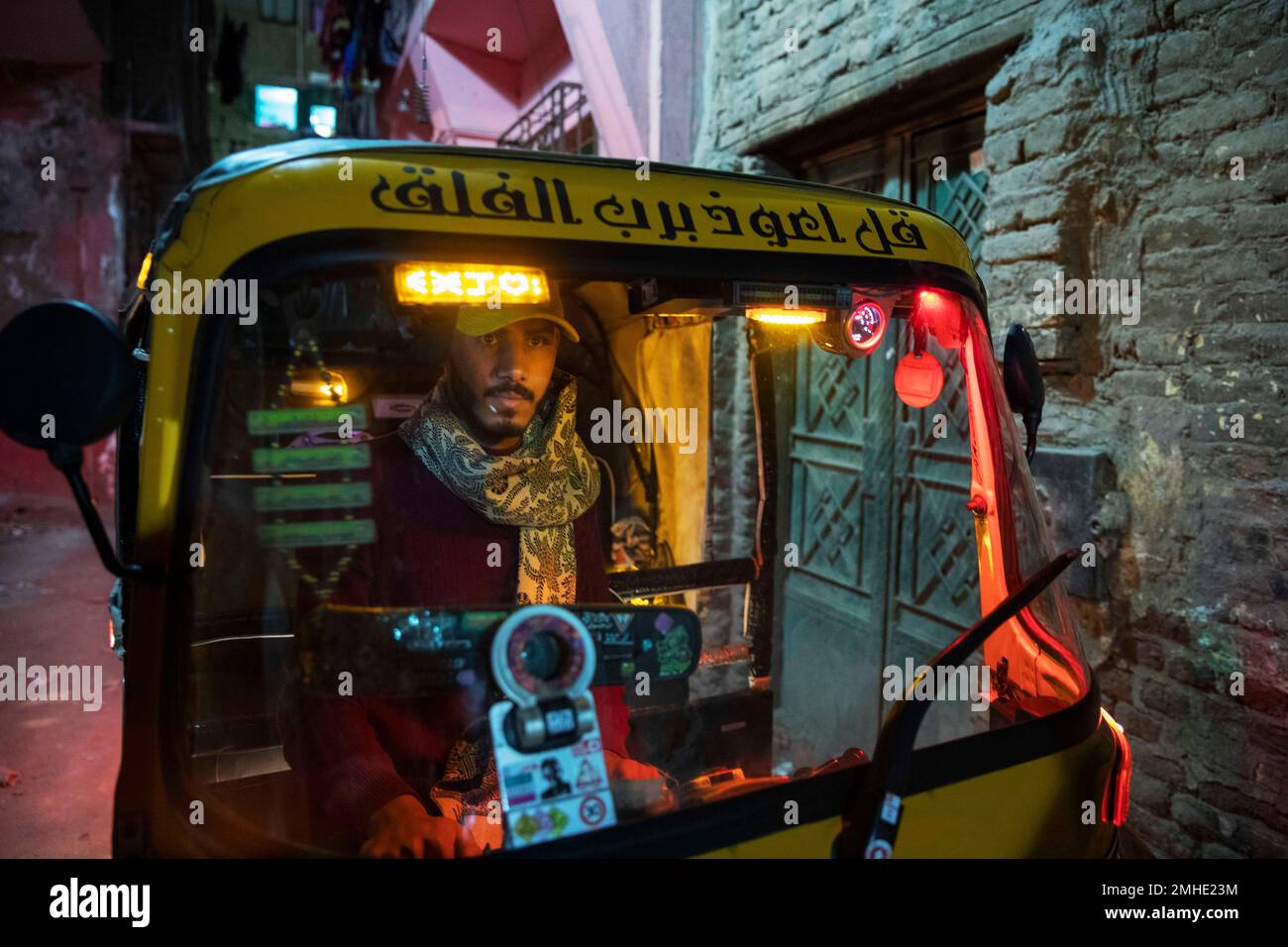 In this Nov. 19, 2019 photo, a driver maneuvers his tuk-tuk in a narrow ...