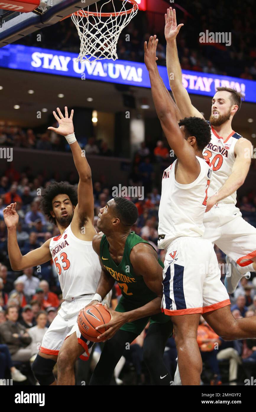 Virginia guard Tomas Woldetensae (53). forward Jay Huff (30) and guard ...
