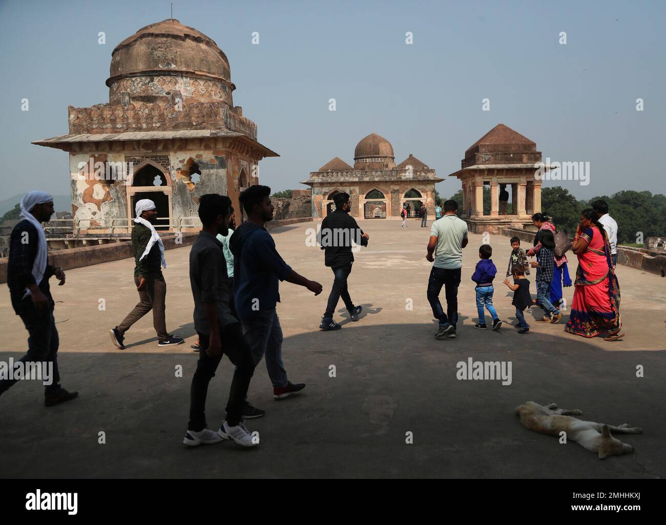Tourists visit Jahaz Mahal or Ship Palace in Mandu also known as Mandav ...