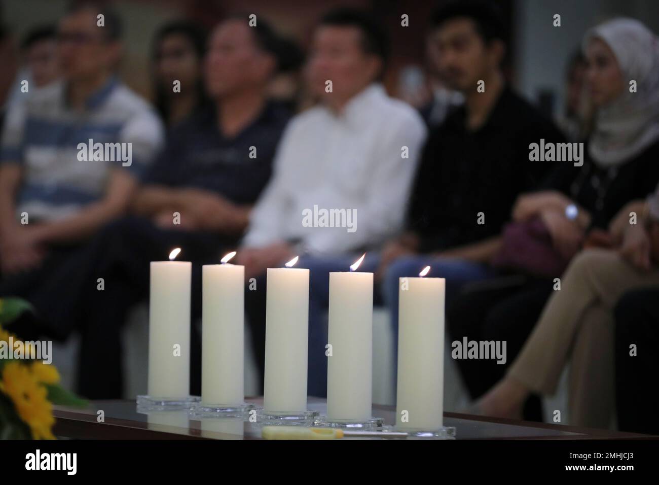 FILE - In this file photo dated Wednesday, July 17, 2019, Friends and family of victims from ...