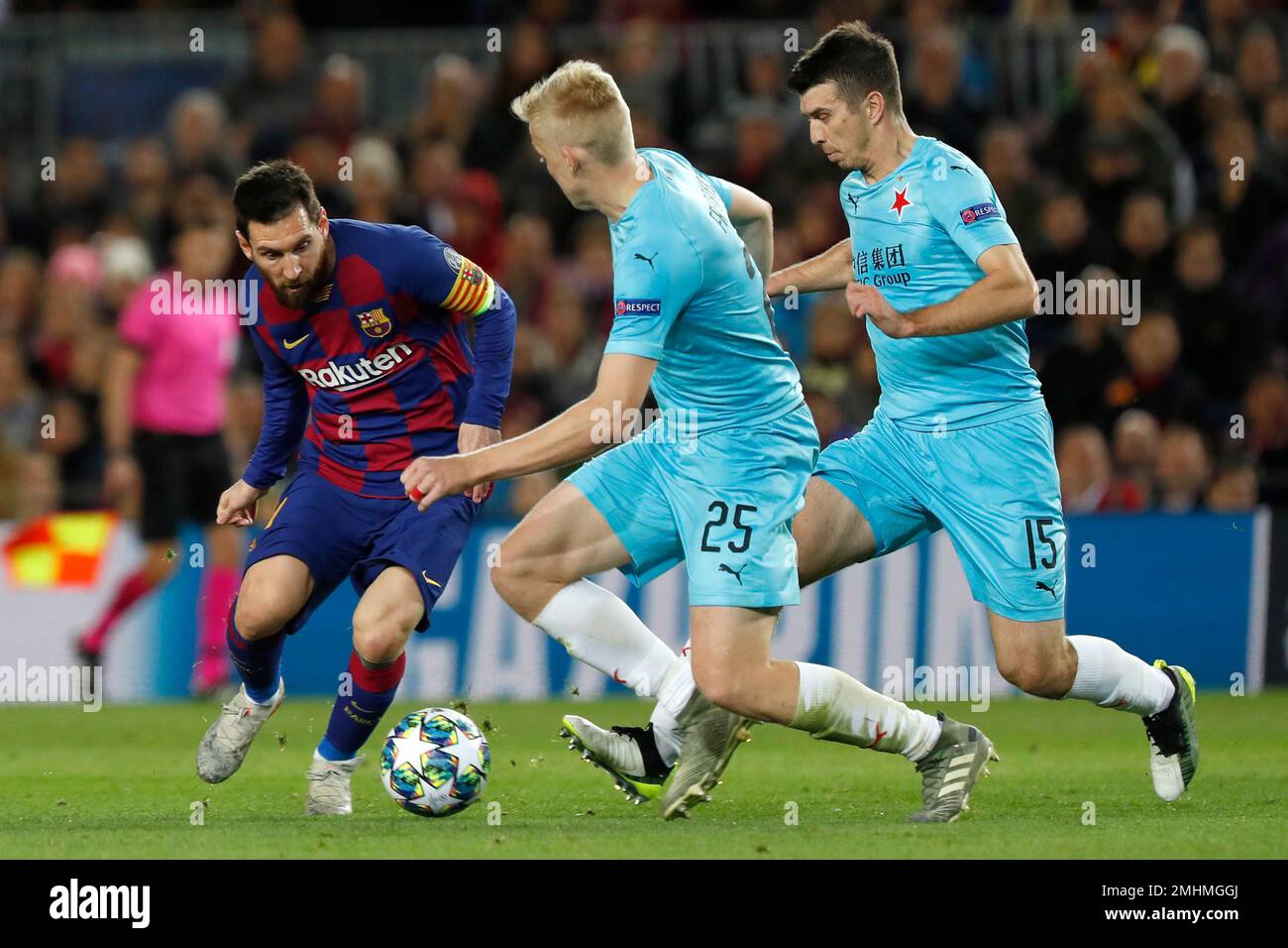 Barcelona's Lionel Messi, challenges for the ball with Slavia's Michal ...