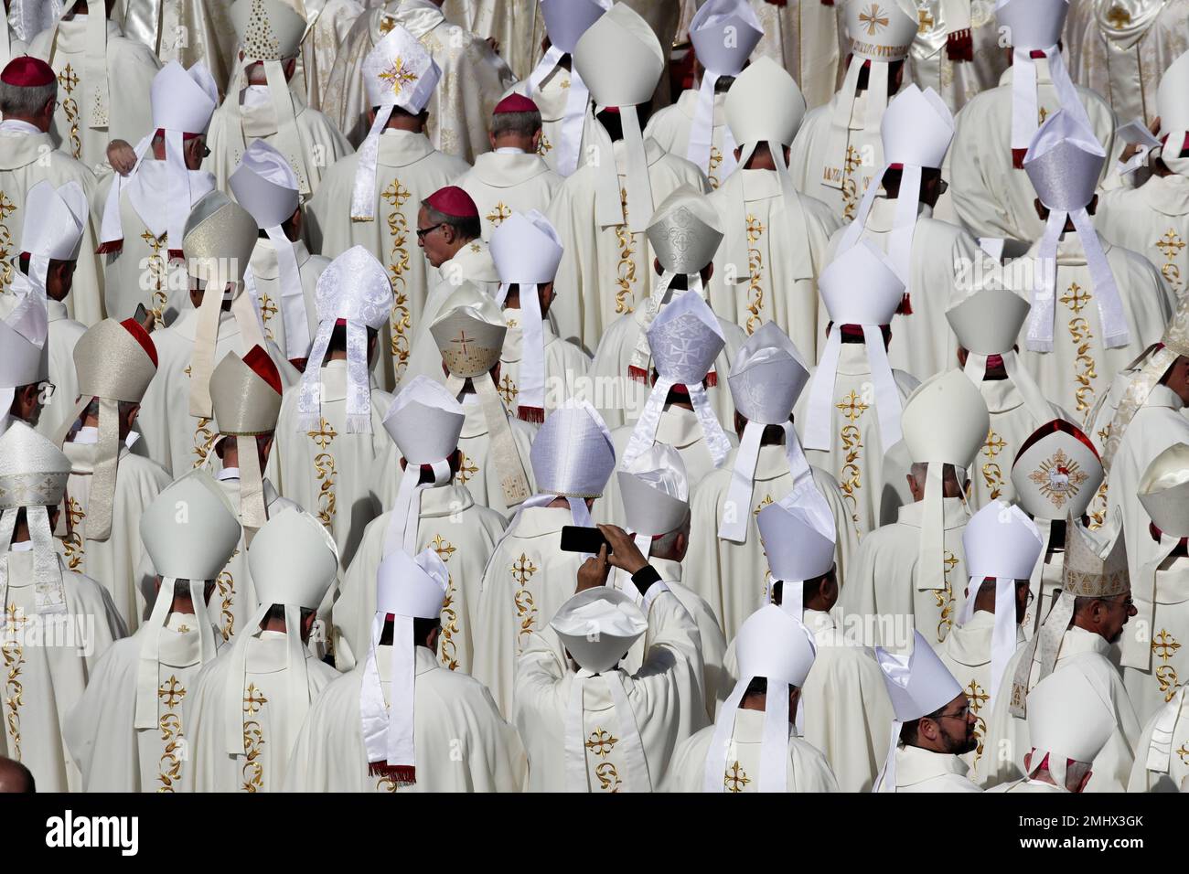 Prelates attend a canonization Mass in St. Peter's Square at the ...