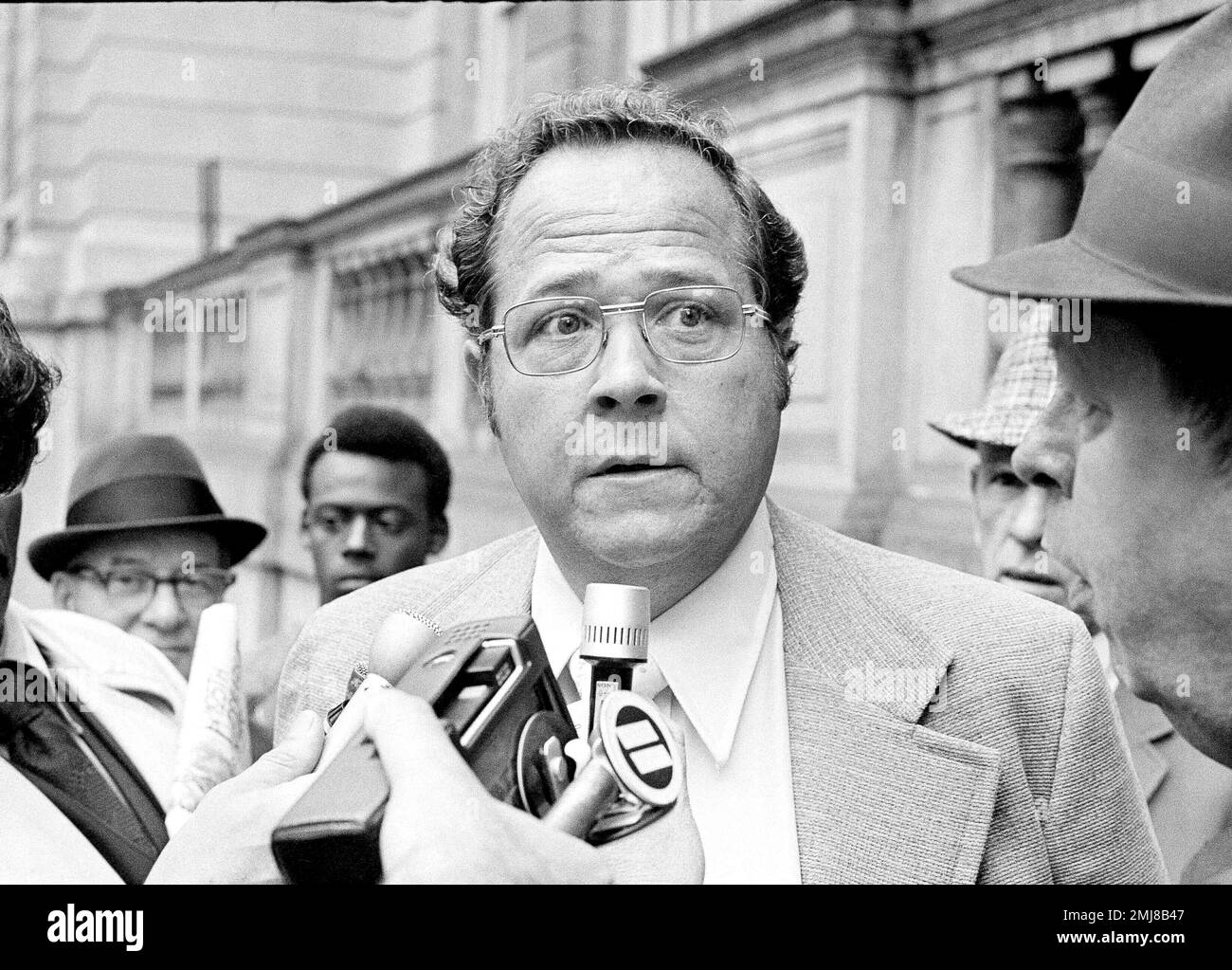 Former state Senator George Snyder talks with newsmen outside the ...