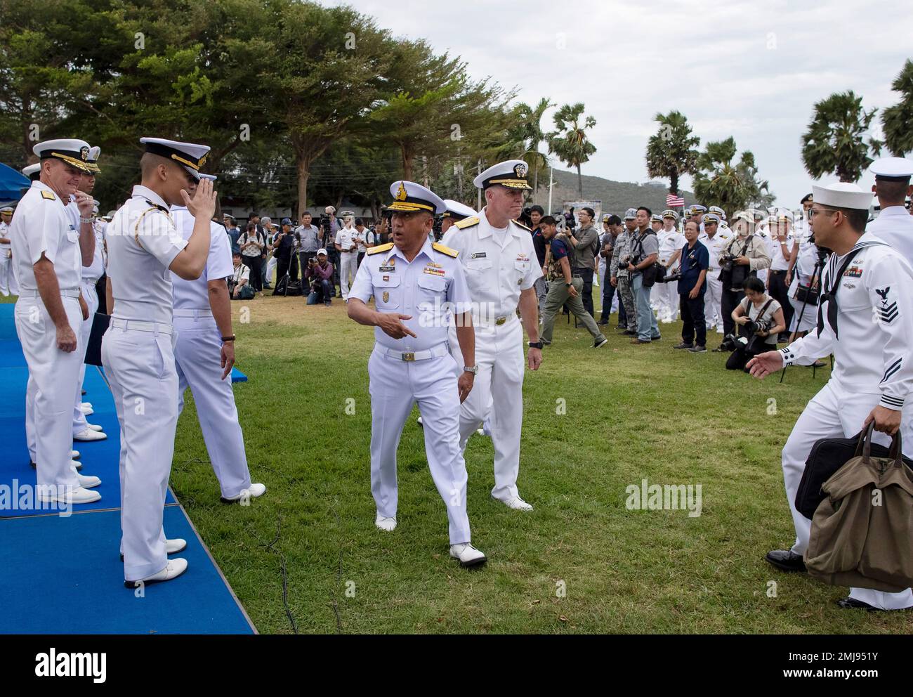 Vice Admiral Charoenpol Khumrasri of Royal Thai Navy, center left, and ...