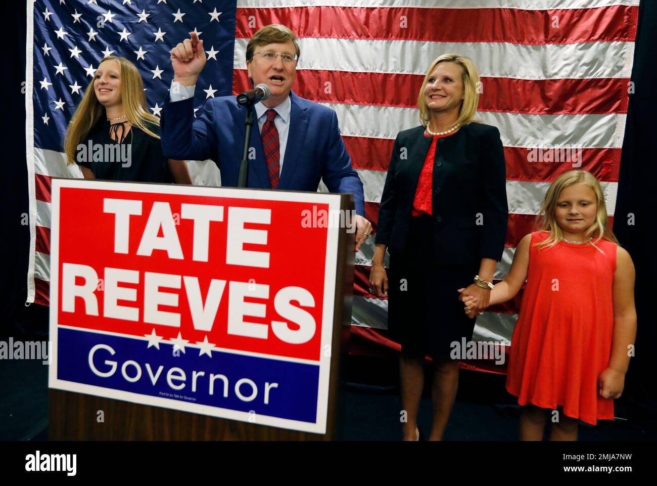 Lt. Gov. Tate Reeves, center, flanked by daughter Tyler Reeves, left ...