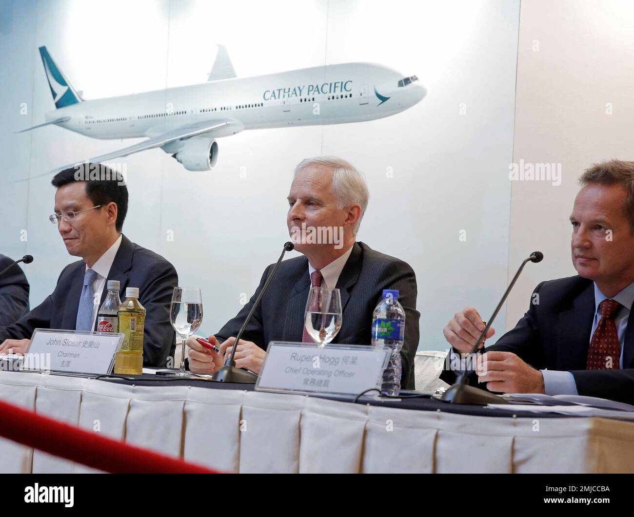 FILE - In this March 15, 2017, file photo, from right, Cathay Pacific ...