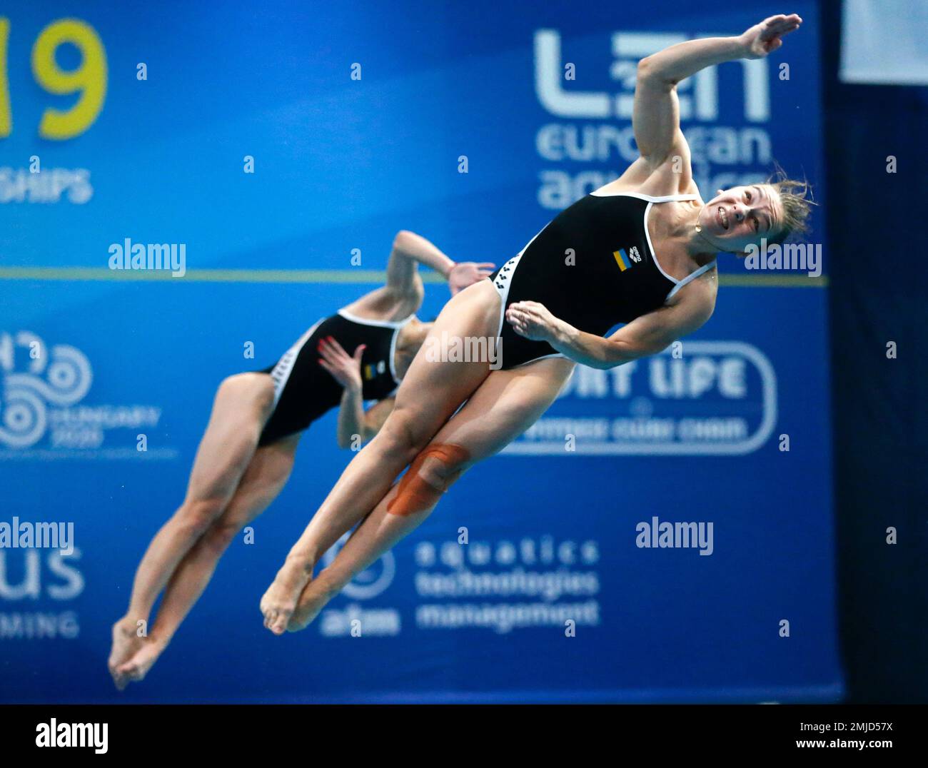 Ukraine's Viktoriya Kesar and Anna Pysmenska compete on their way to ...