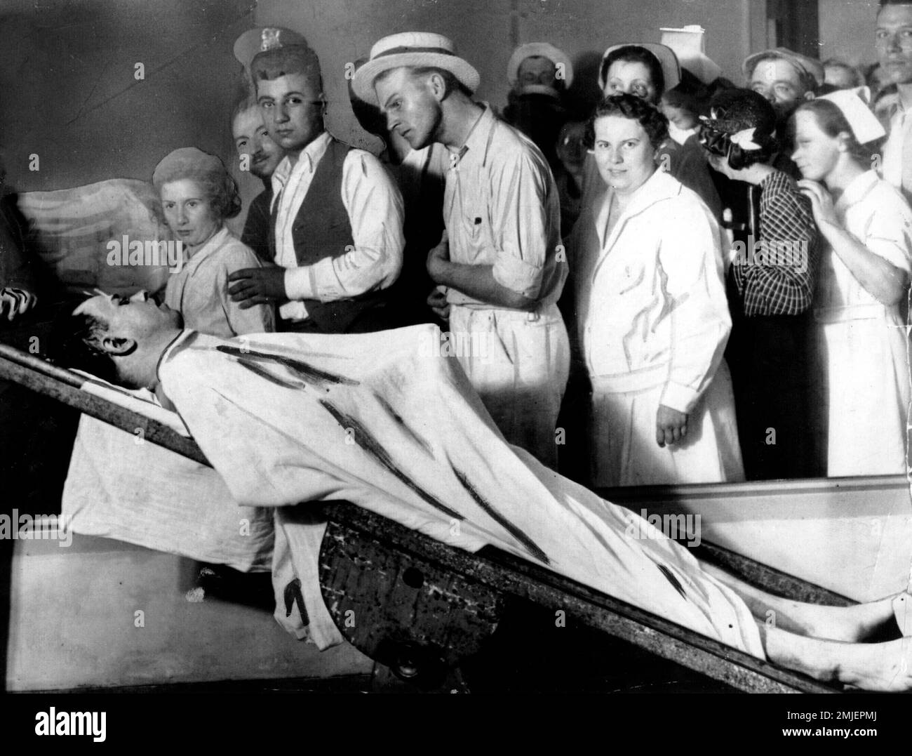 CORRECTS DATE TO JULY 1934, NOT DECEMBER 1934 - FILE - In this July 1934 file photo, people view ...