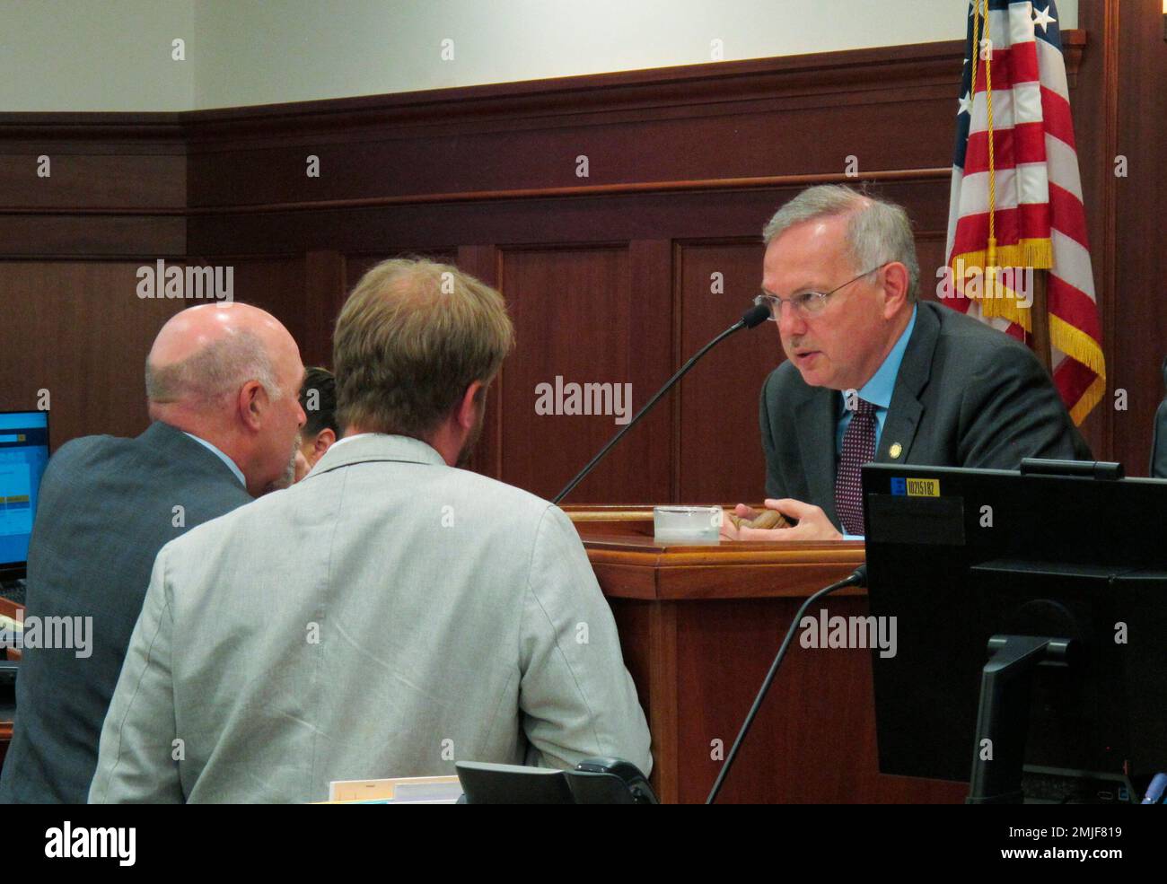Alaska House Speaker Bryce Edgmon, right, speaks to Reps. Adam Wool ...