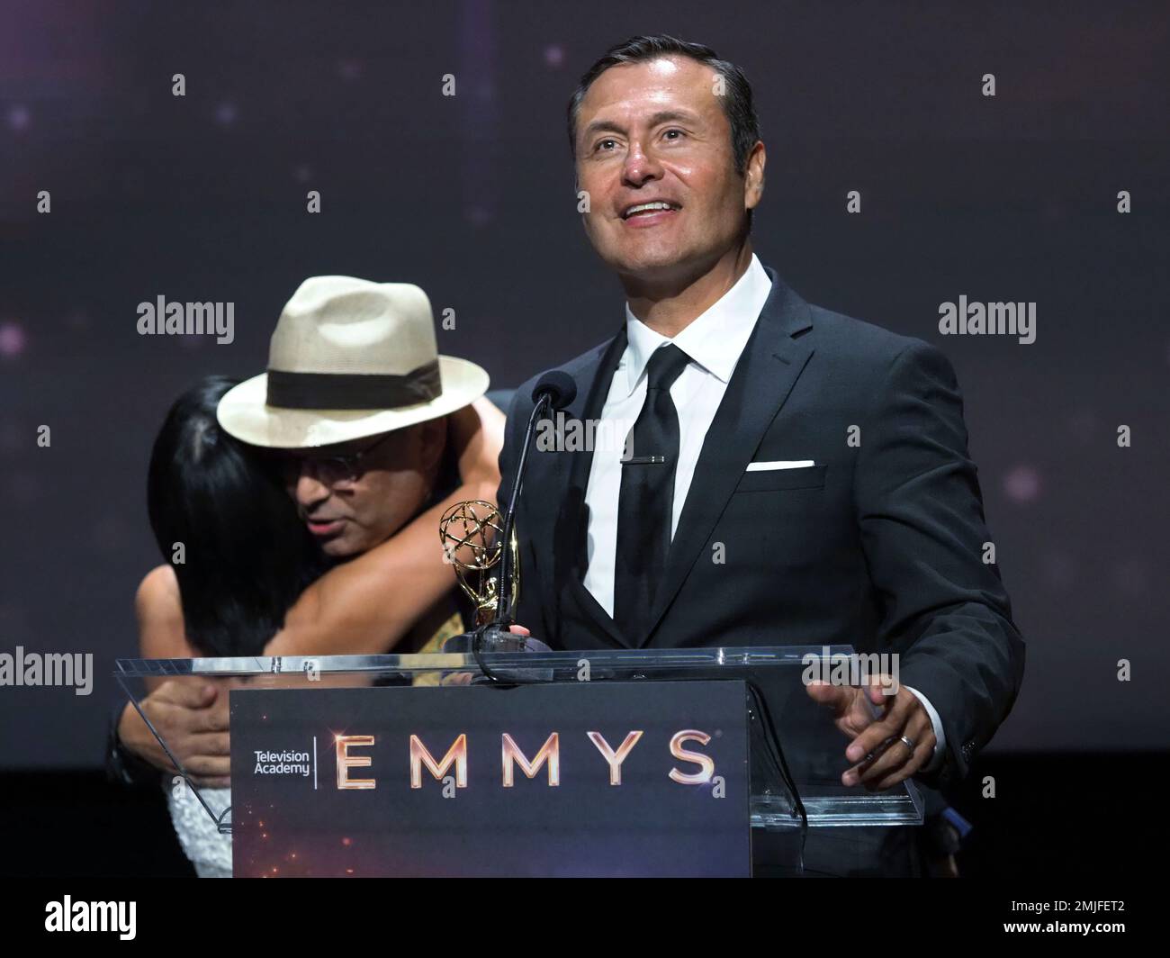 EXCLUSIVE - A member of the KMEX News Team accepts the Emmy for ...