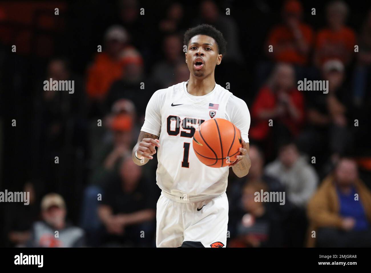 Oregon State guard Christian Wright (1) brings the ball up the court ...