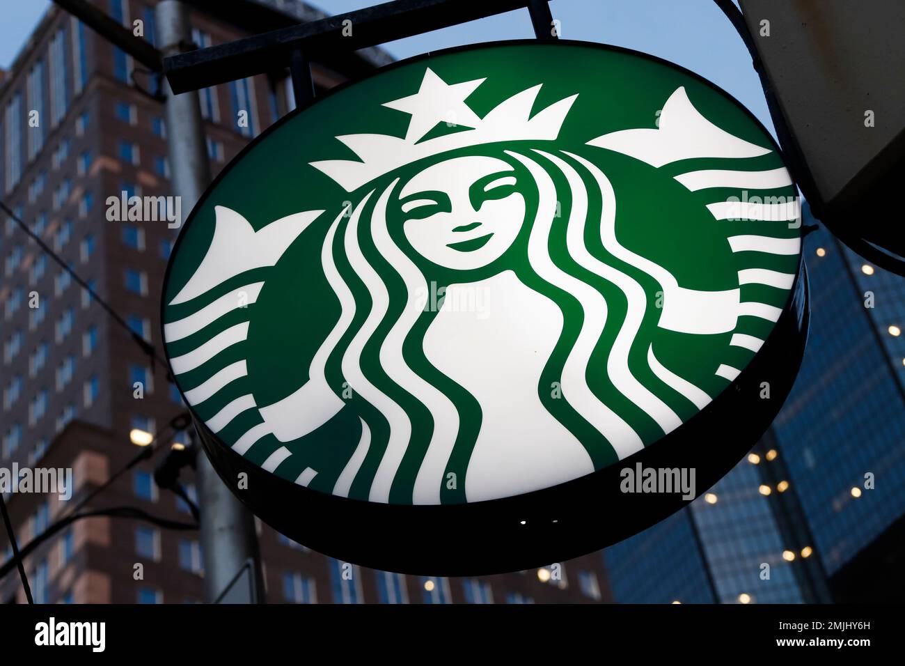 FILE - This June 26, 2019, file photo shows a Starbucks sign outside a ...