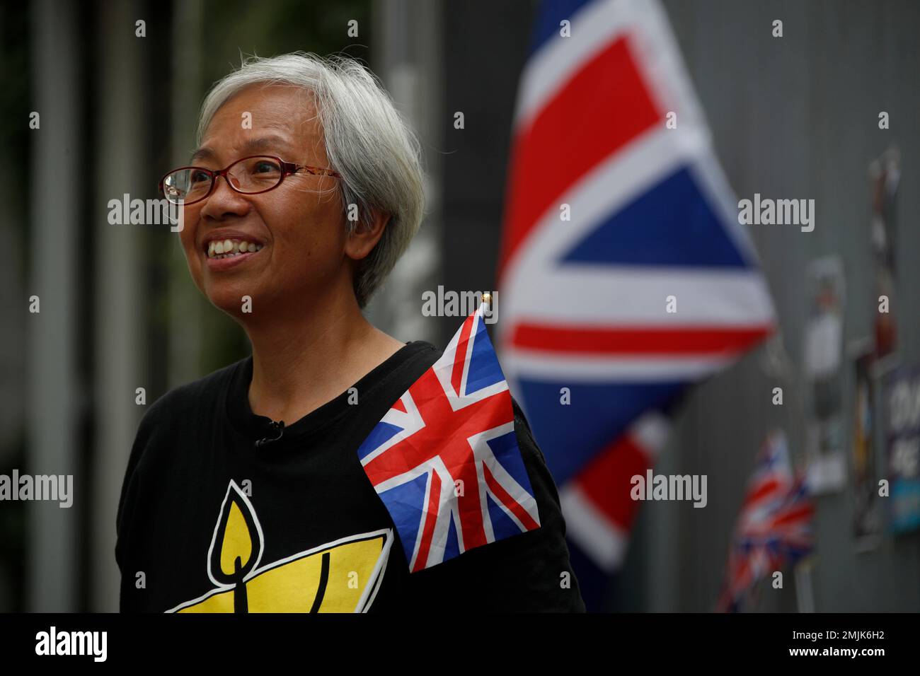 In this Thursday July 4, 2019, photo, Alexandra Wong, 63, a protester ...