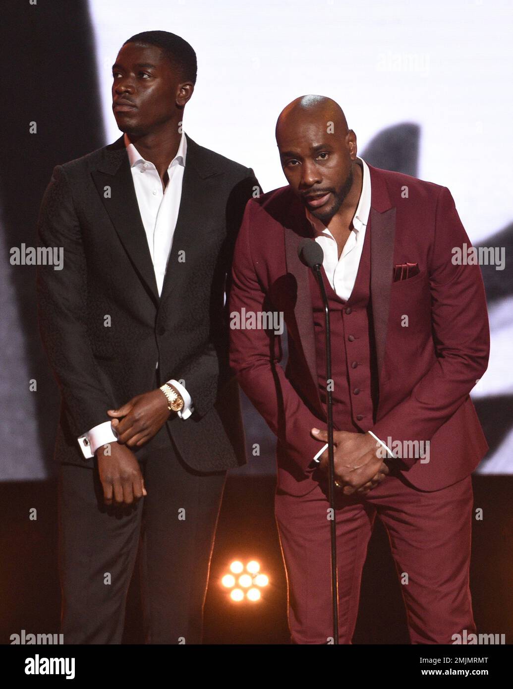 Damson Idris, left, and Morris Chestnut introduce a tribute to John ...