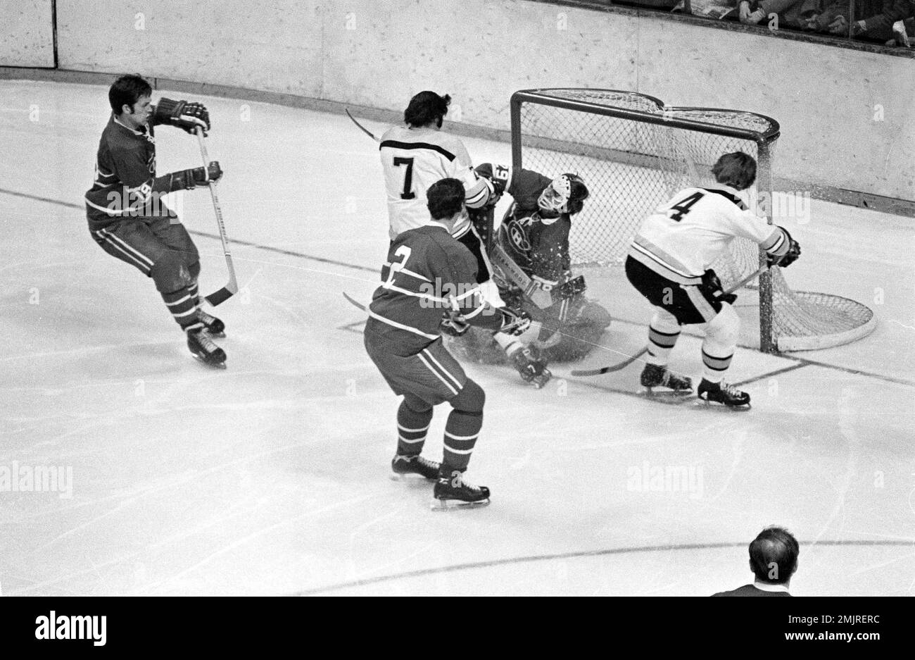 Montreal Canadiens goalie Ken Dryden makes a save off the stick of ...