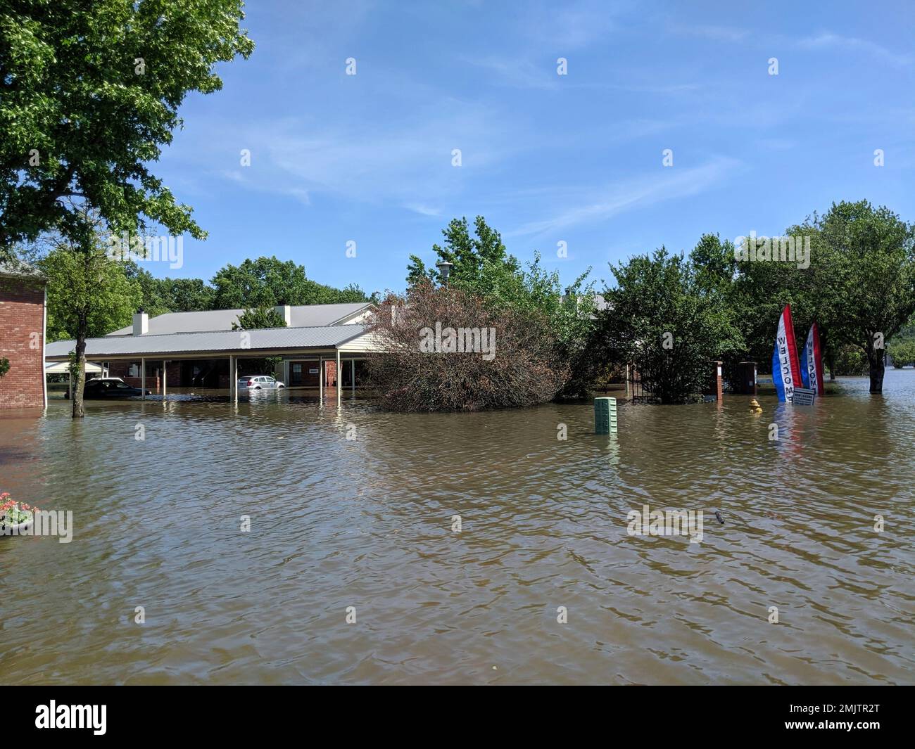 Flood waters surround homes, Thursday, May 30, 2019 in Fort Smith, Ark ...