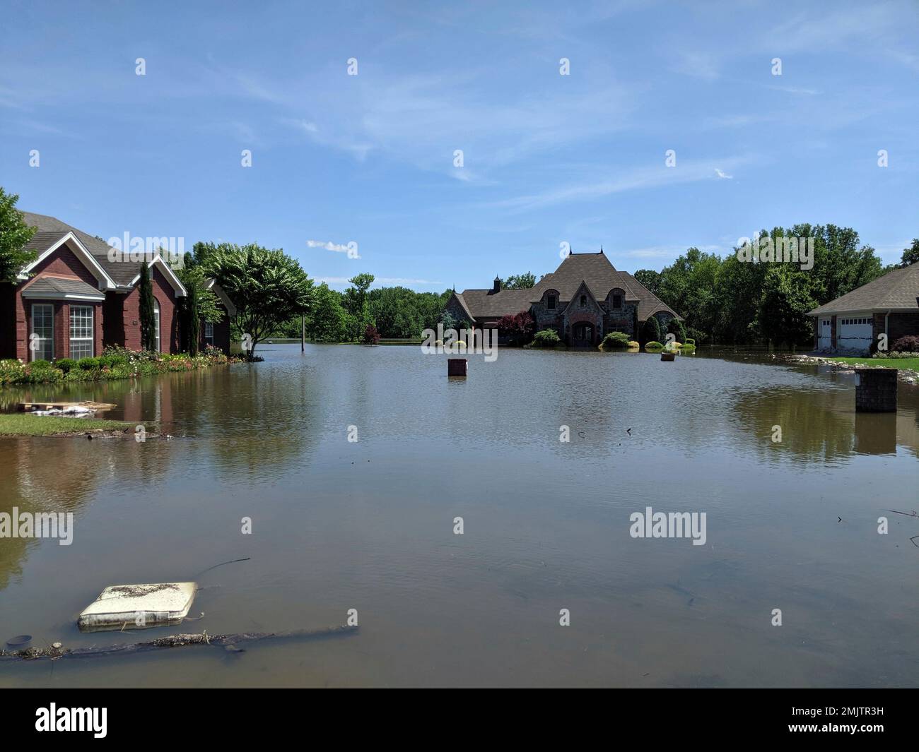 Flood waters surround homes, Thursday, May 30, 2019 in Fort Smith, Ark ...