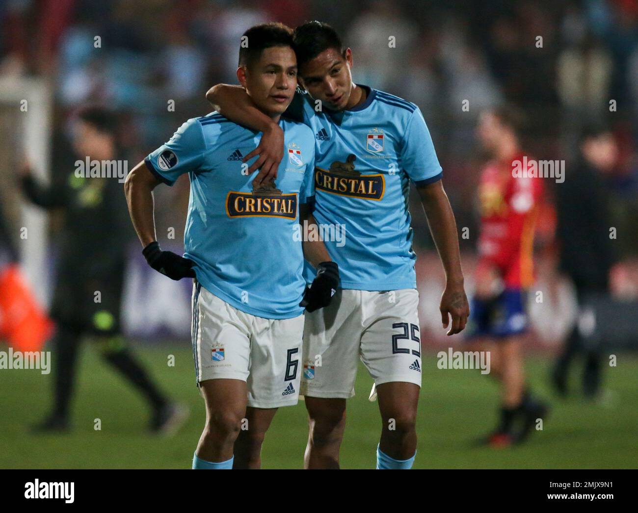 Jesus Pretell of Peru's Sporting Cristal embraces team mate Gerald ...