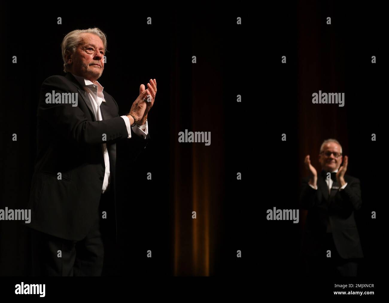 Actor Alain Delon accepts applause prior to receiving his honorary ...