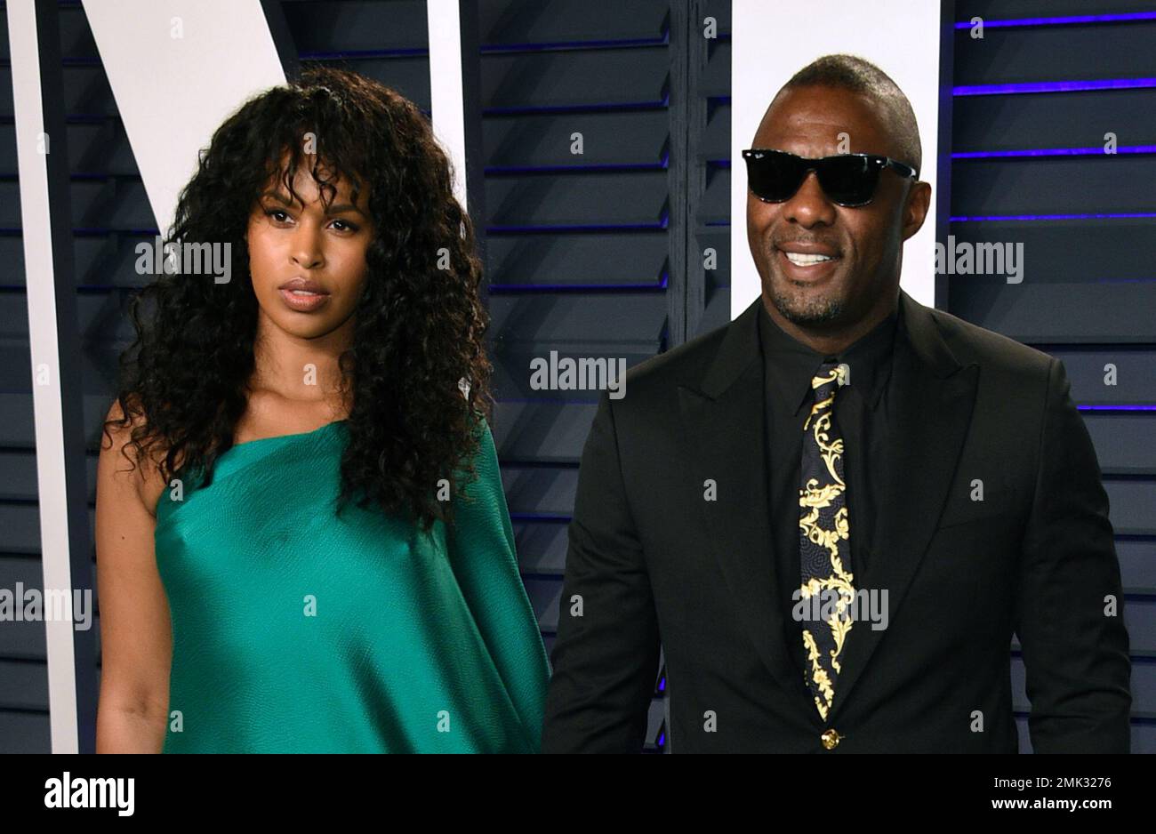 FILE - In this Sunday, Feb. 24, 2019 file photo, Idris Elba, right, and ...
