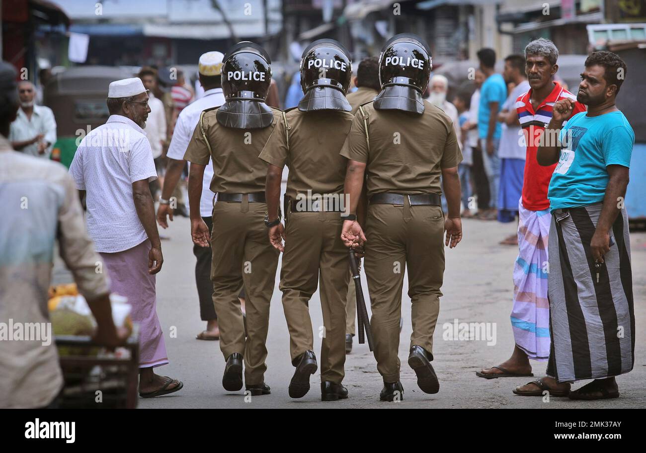 Sri Lankan policeman patrol in a Muslim neighborhood before Friday ...
