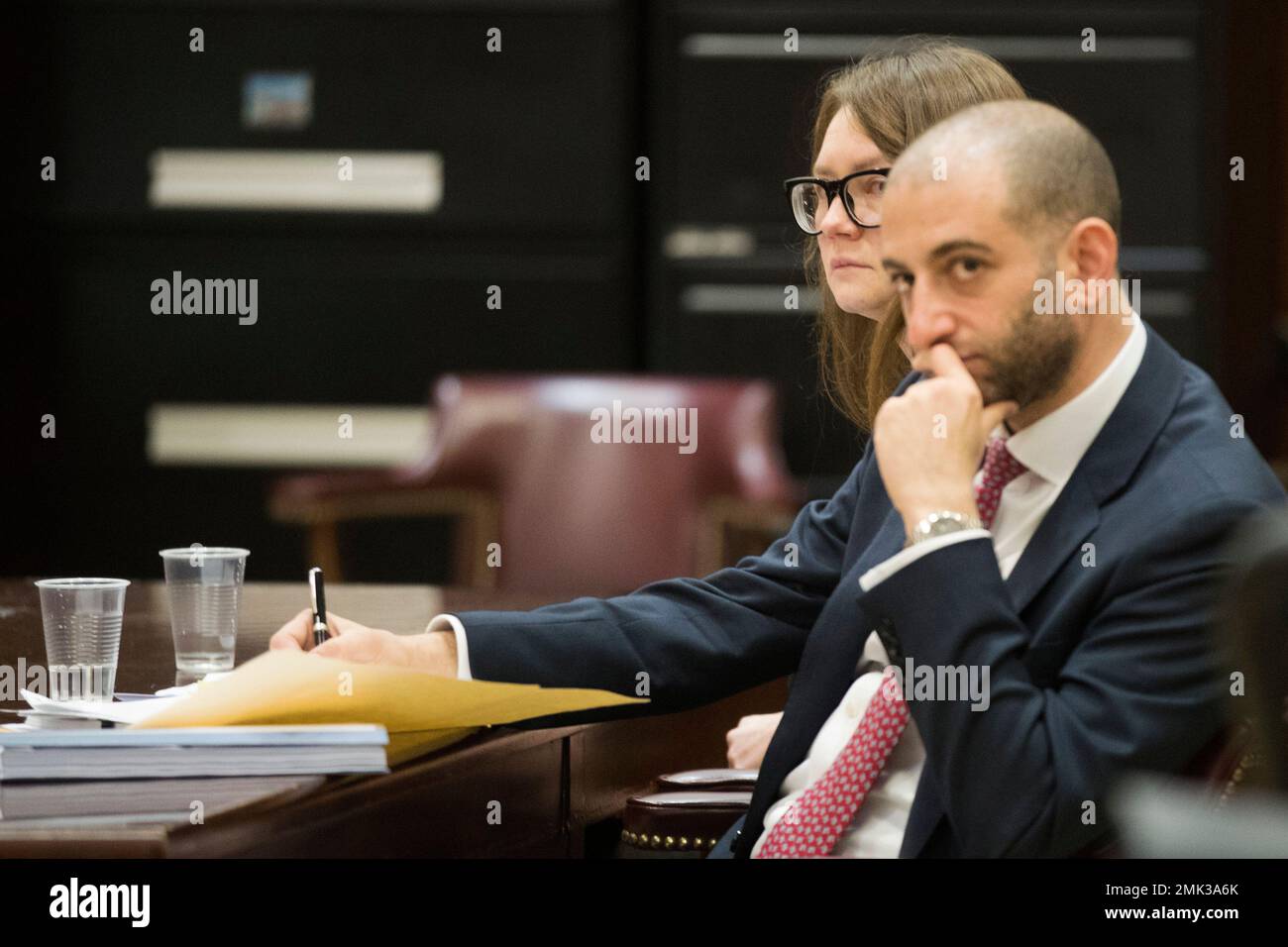 Anna Sorokin, right, and her lawyer Todd Spodek listens as the jury ...
