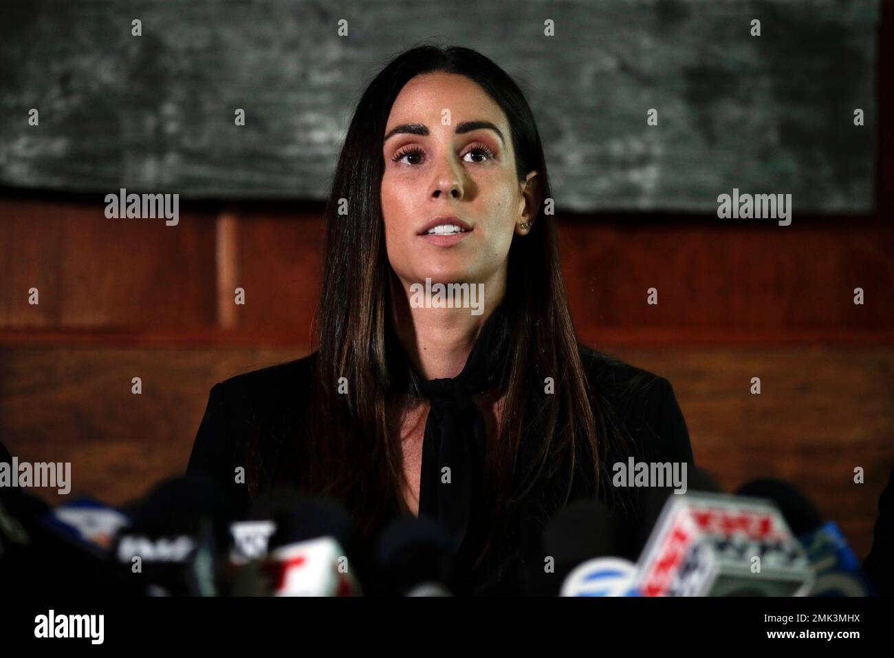 Former sports reporter Kelli Tennant speaks during a news conference ...