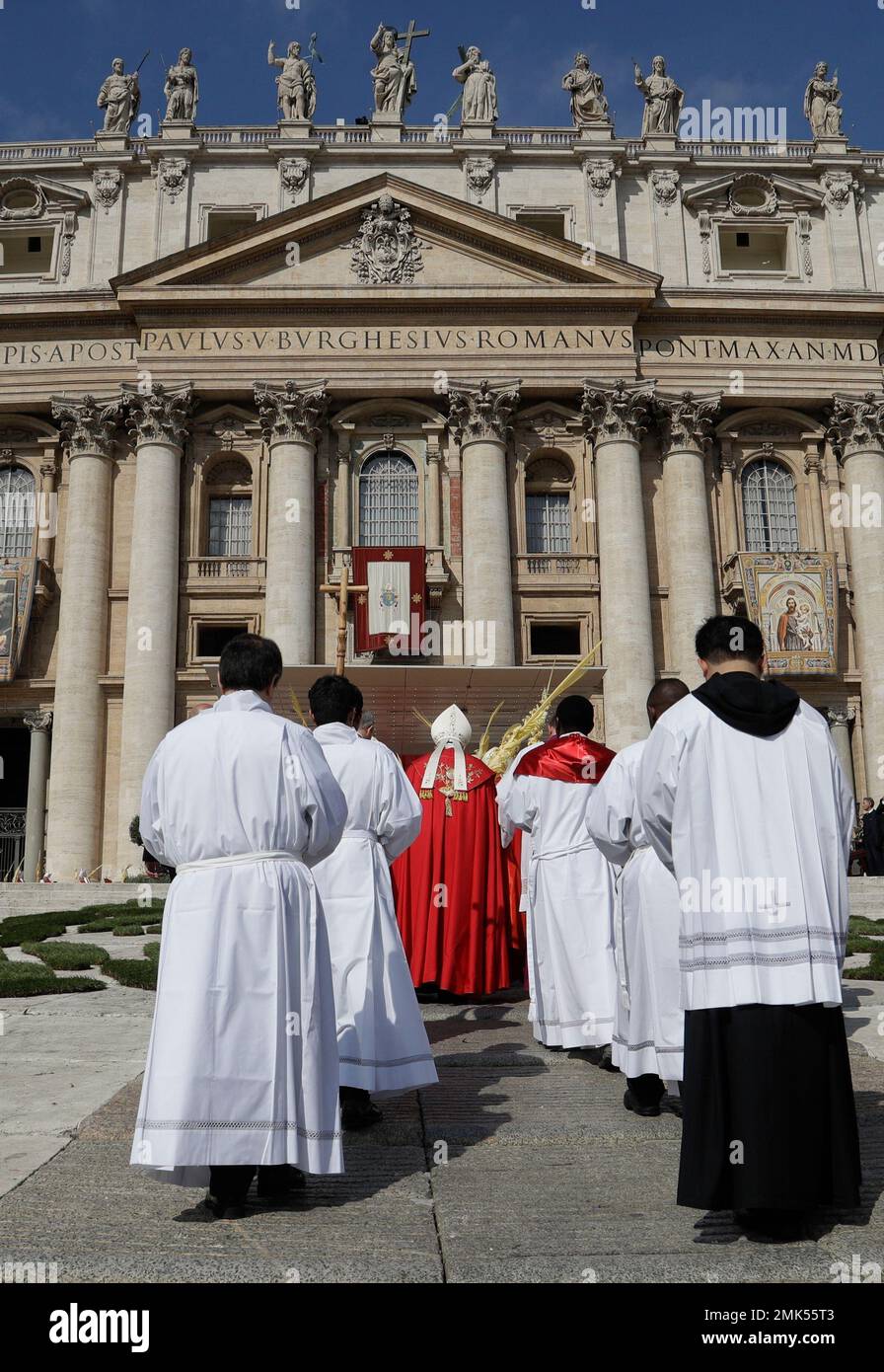 Pope Francis, center, walks in procession as he celebrates a Palm ...
