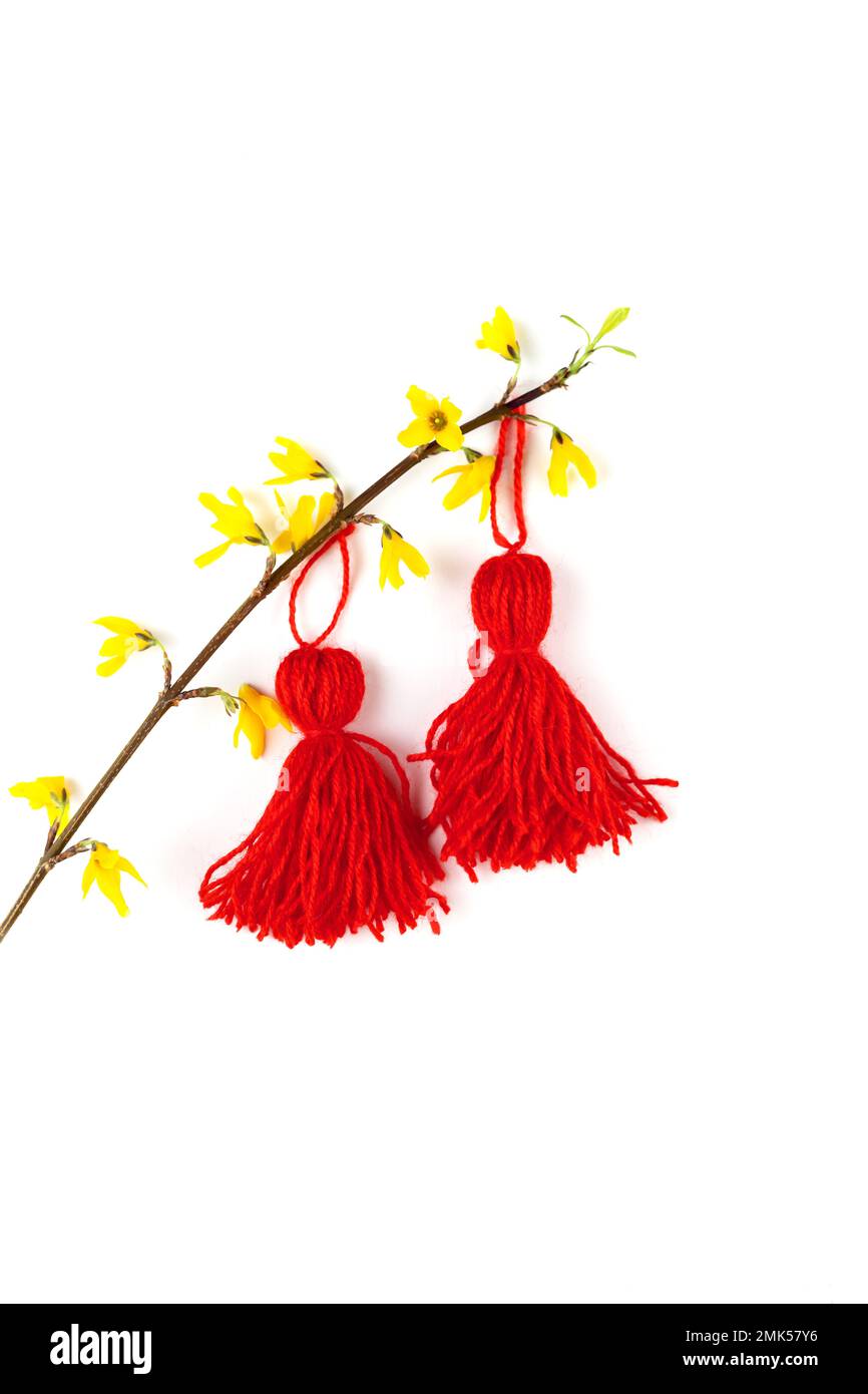 Rotes Baba-Marta-Symbol mit Quaste, Martenitsa auf weißer Karte. Der ...